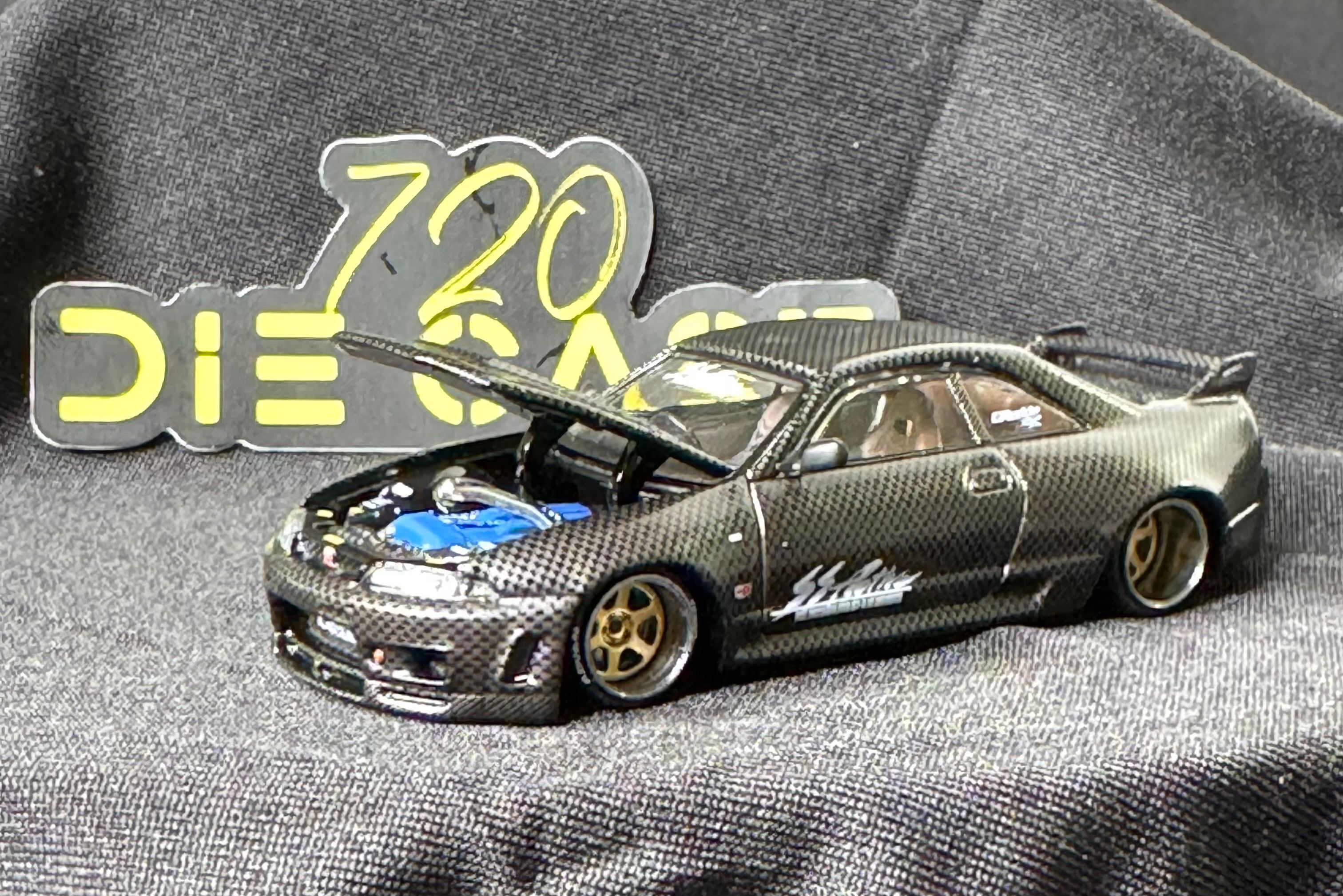 KAIDO HOUSE MINI GT Nissan Skyline GT-R (R33) Active Carbon KAIDO HOUSE MINI GT Nissan Skyline GT-R (R33) Active Carbon