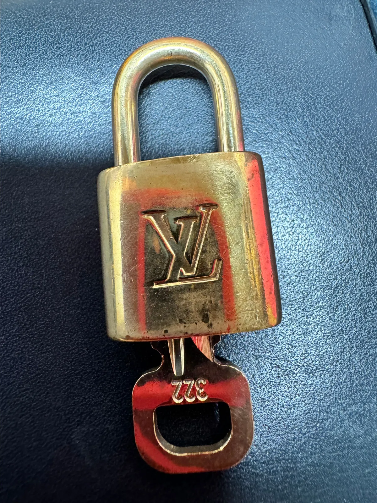 Louis Vuitton lock and key #322 · Whatnot: Buy, Sell & Go Live