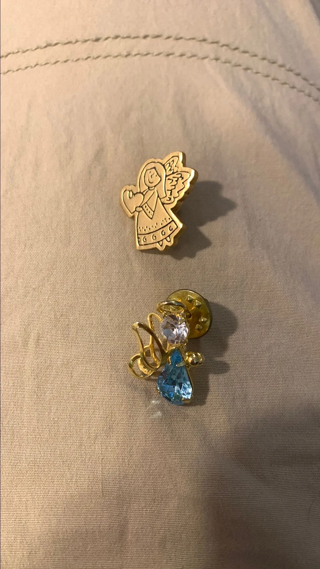 Angel pins · Whatnot: Buy, Sell & Go Live