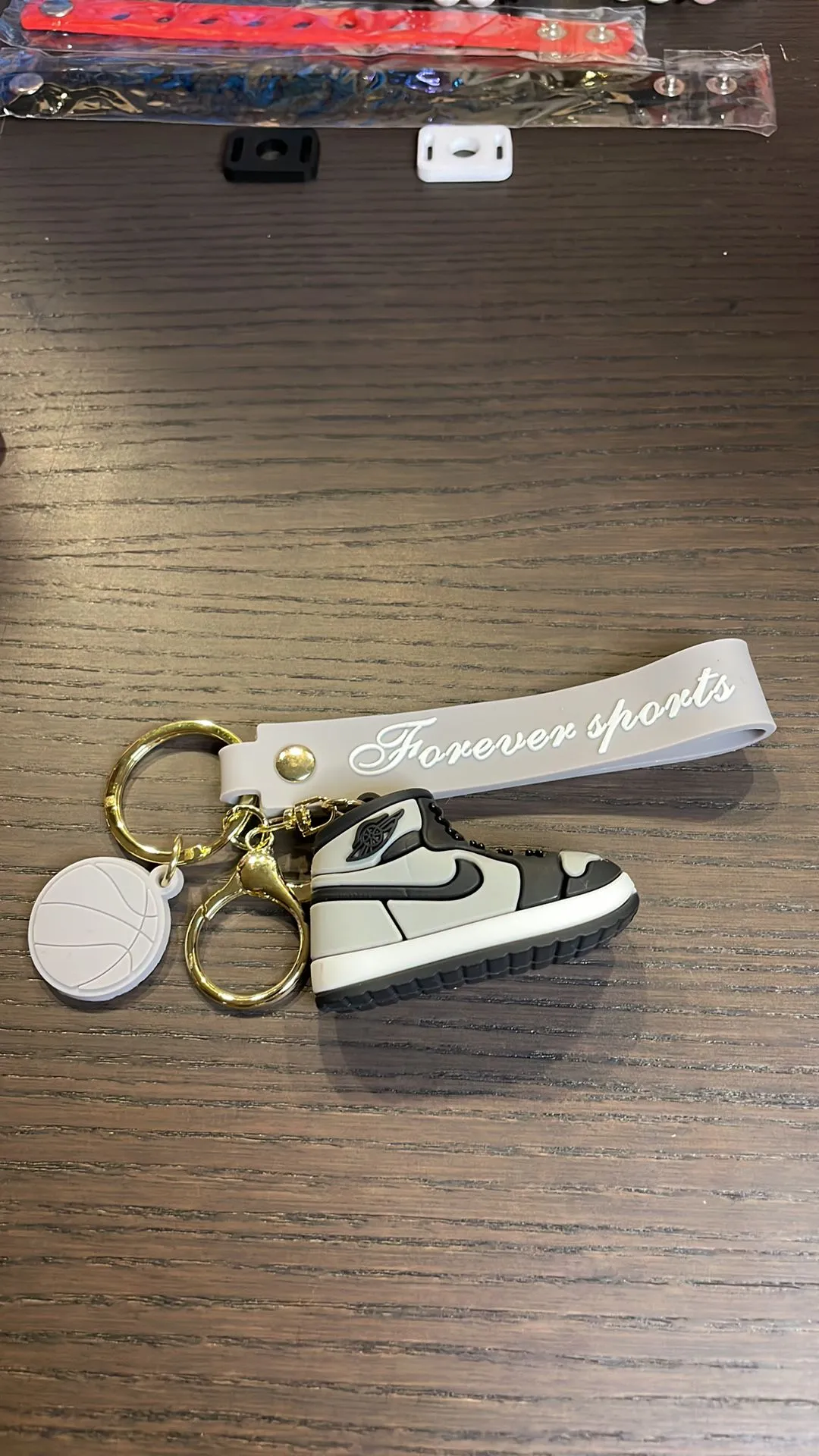 Grey Nike keychain · Whatnot: Buy, Sell & Go Live