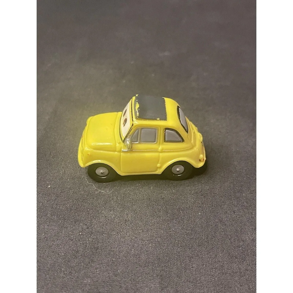 DISNEY PIXAR CARS YELLOW LUIGI FIAT TOY PLASTIC CAR (JL) · Whatnot: Buy ...